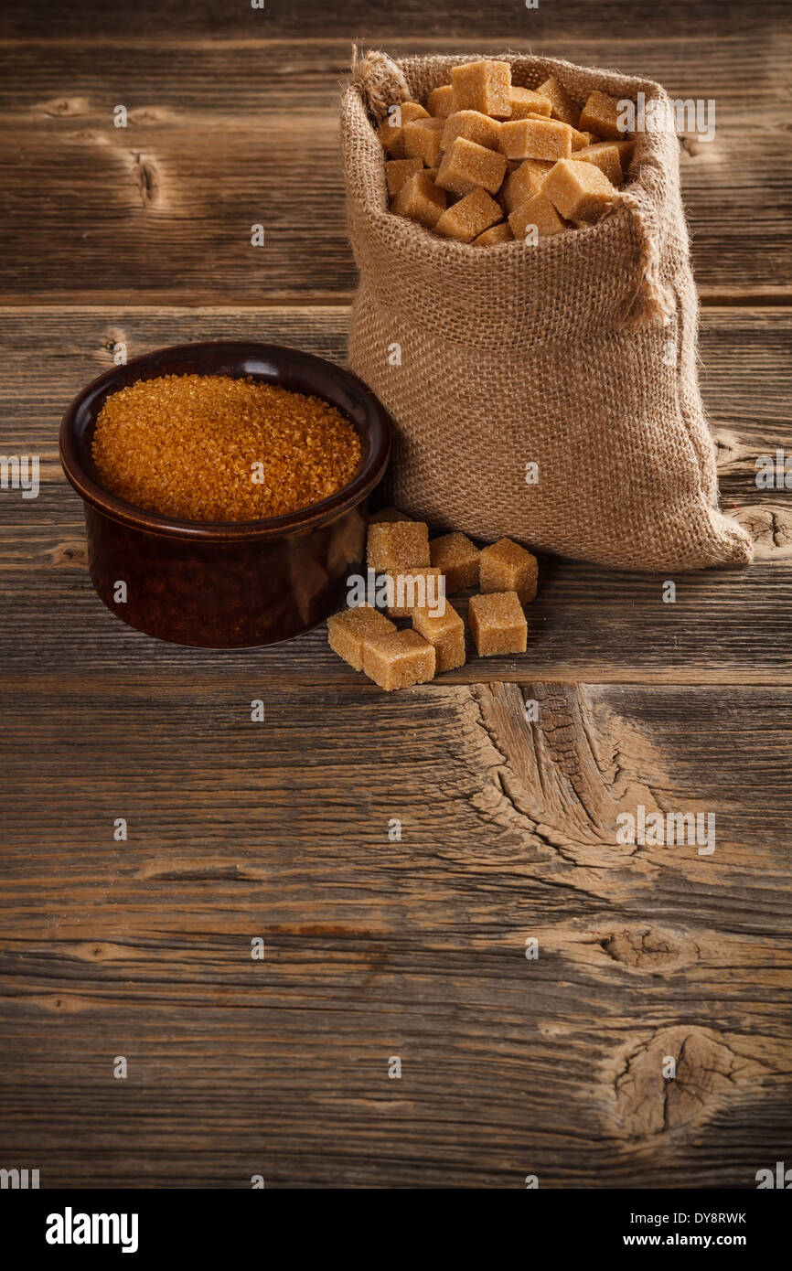 Brown sugar cubes in burlap sack Stock Photo - Alamy