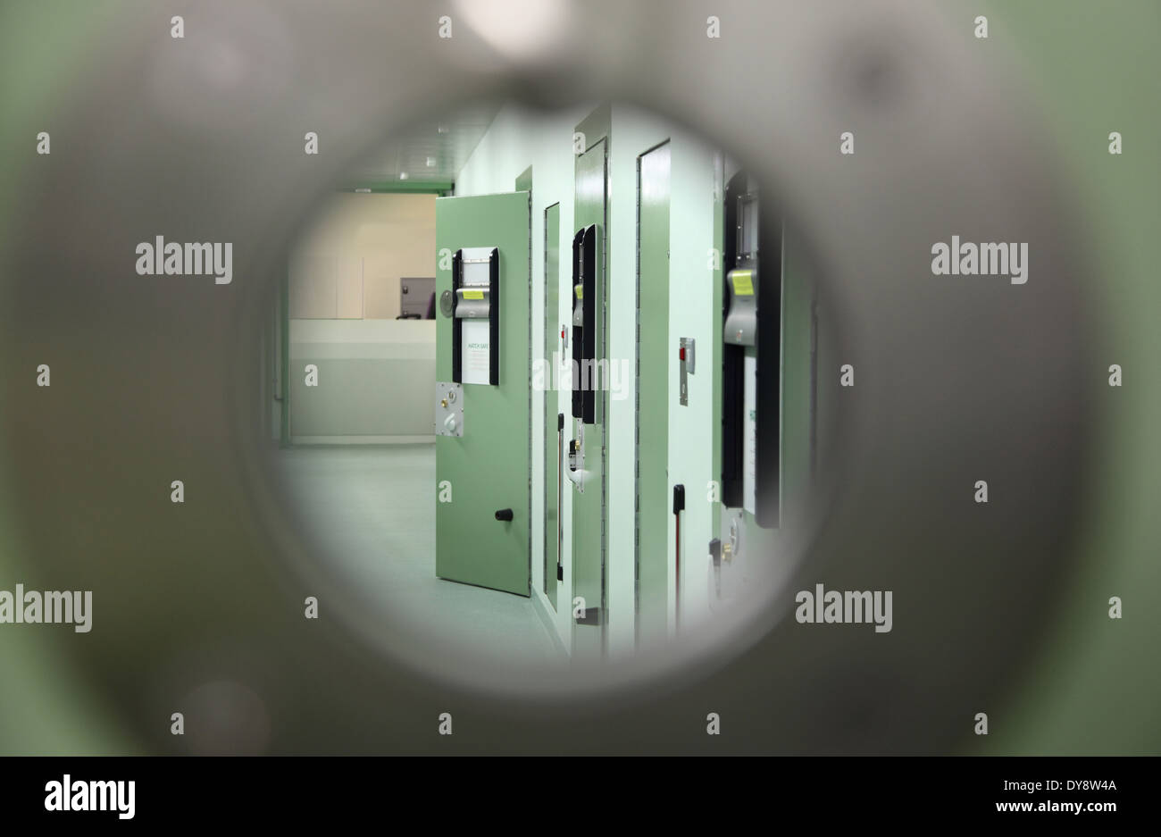 British police custody cell corridor. View through cell door 'spy-hole ...