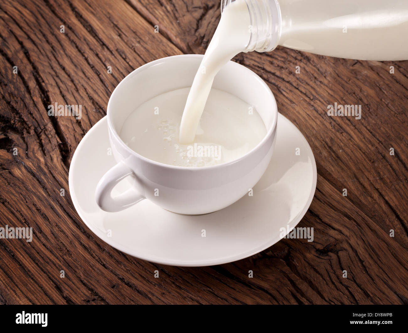 Table pouring milk hi-res stock photography and images - Alamy