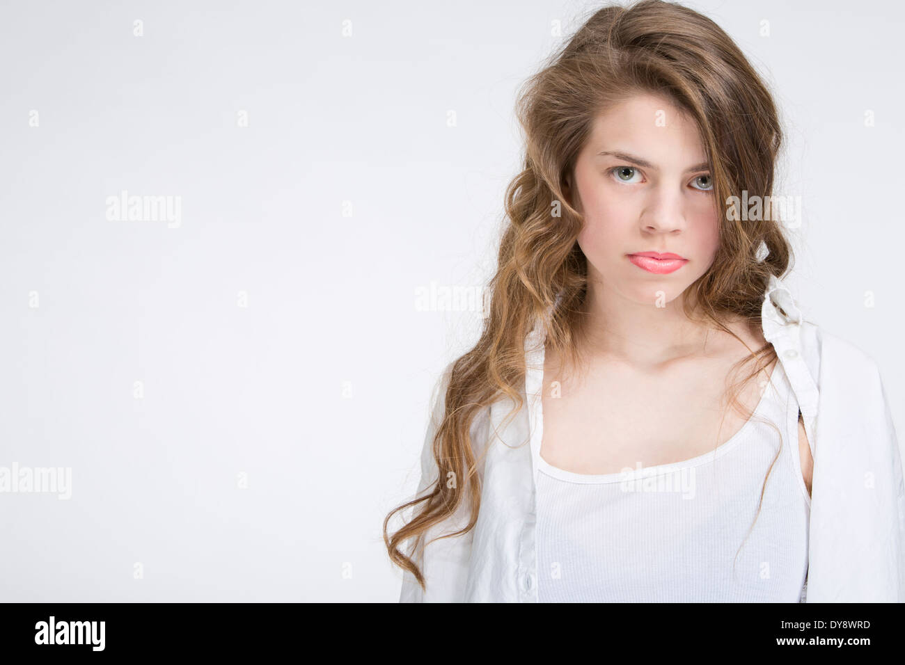 Portrait of serious looking teenage girl Stock Photo - Alamy