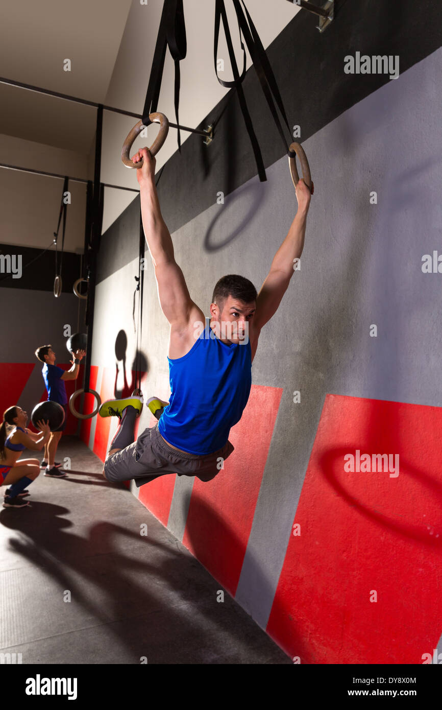 Swinging rings hi-res stock photography and images - Alamy