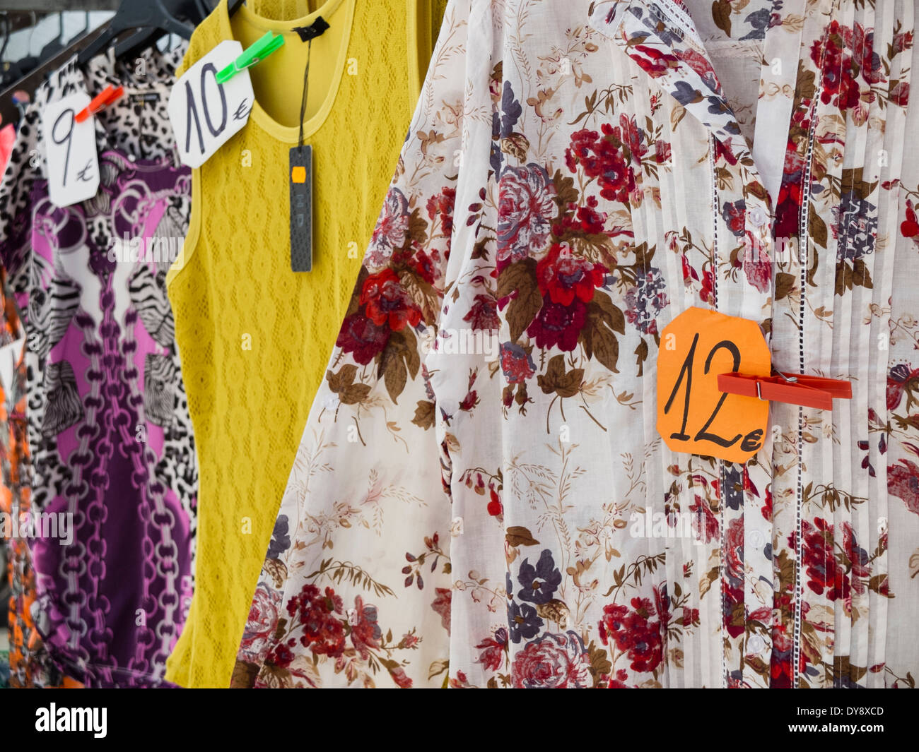 Clothing and household apparel on sale at a street market, Miravet ...