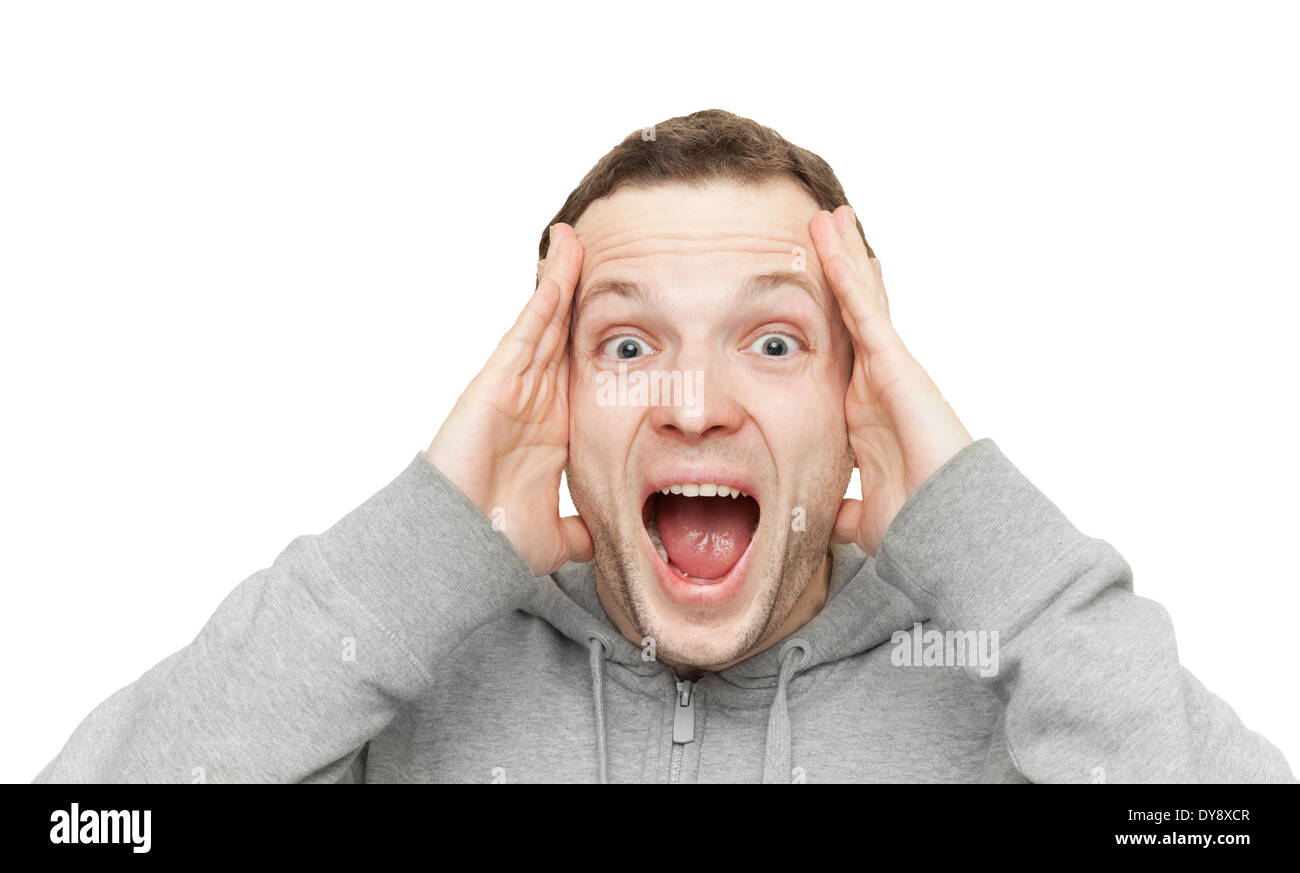 Happy sporty young Caucasian man holding his head and laughs. Portrait ... Happy sporty young Caucasian man holding his head and laughs. Portrait ...