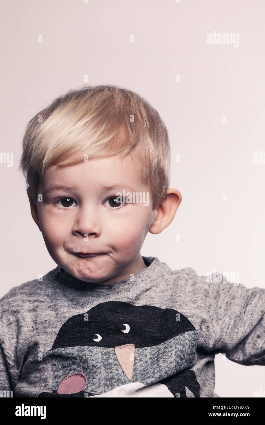 Portrait of little boy pouting a mouth Stock Photo - Alamy Portrait of little boy pouting a mouth Stock Photo - Alamy