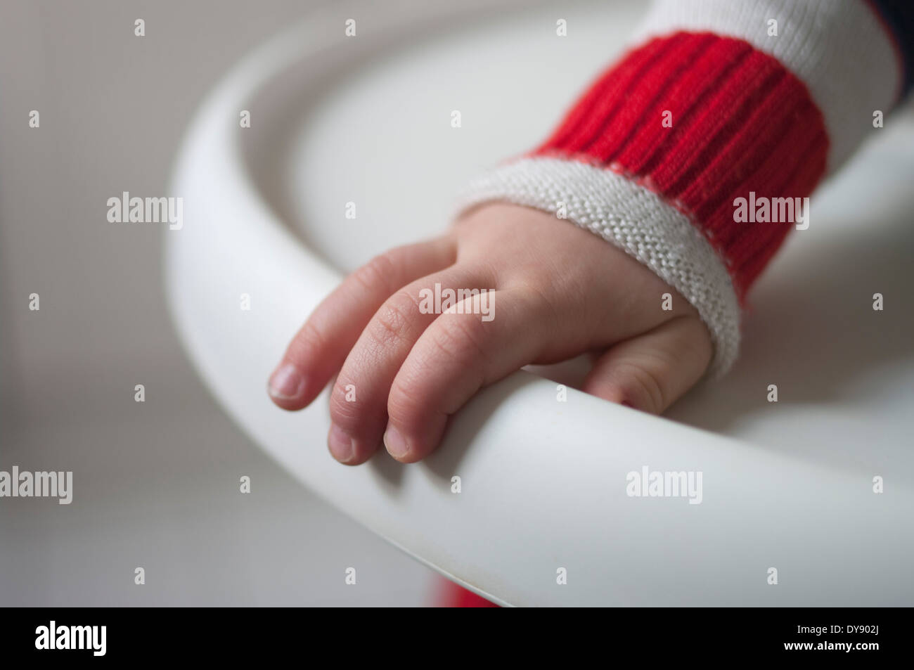 Hand gripping arm of chair hi-res stock photography and images - Alamy