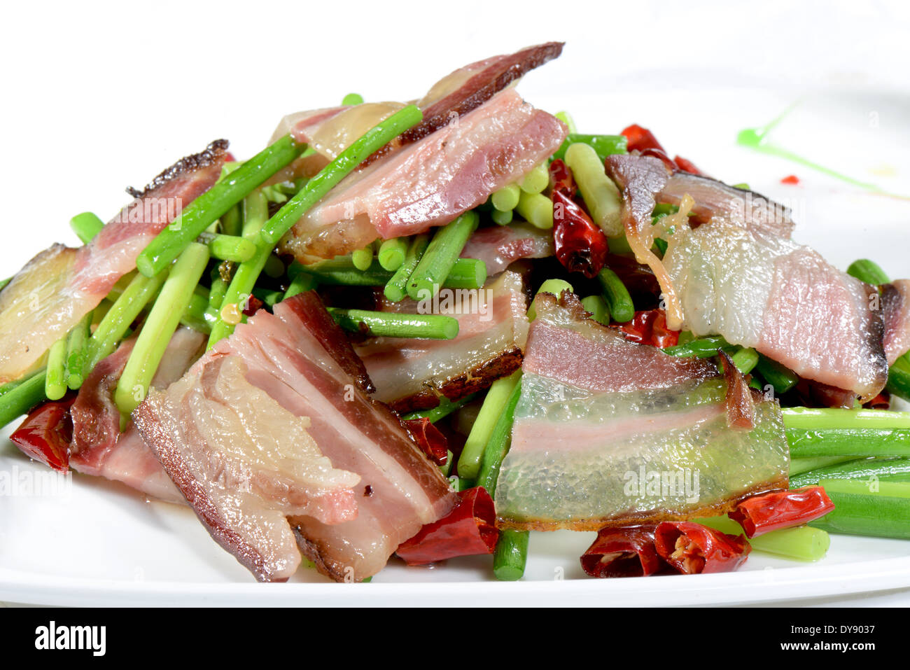 Chinese Food: Fried bacon with vegetable Stock Photo - Alamy