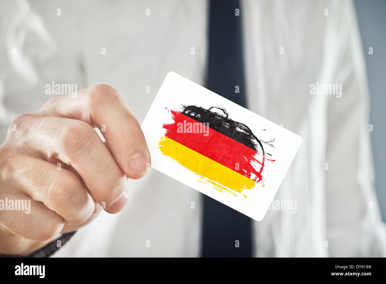 German Businessman holding business card with Germany Flag Stock Photo ...