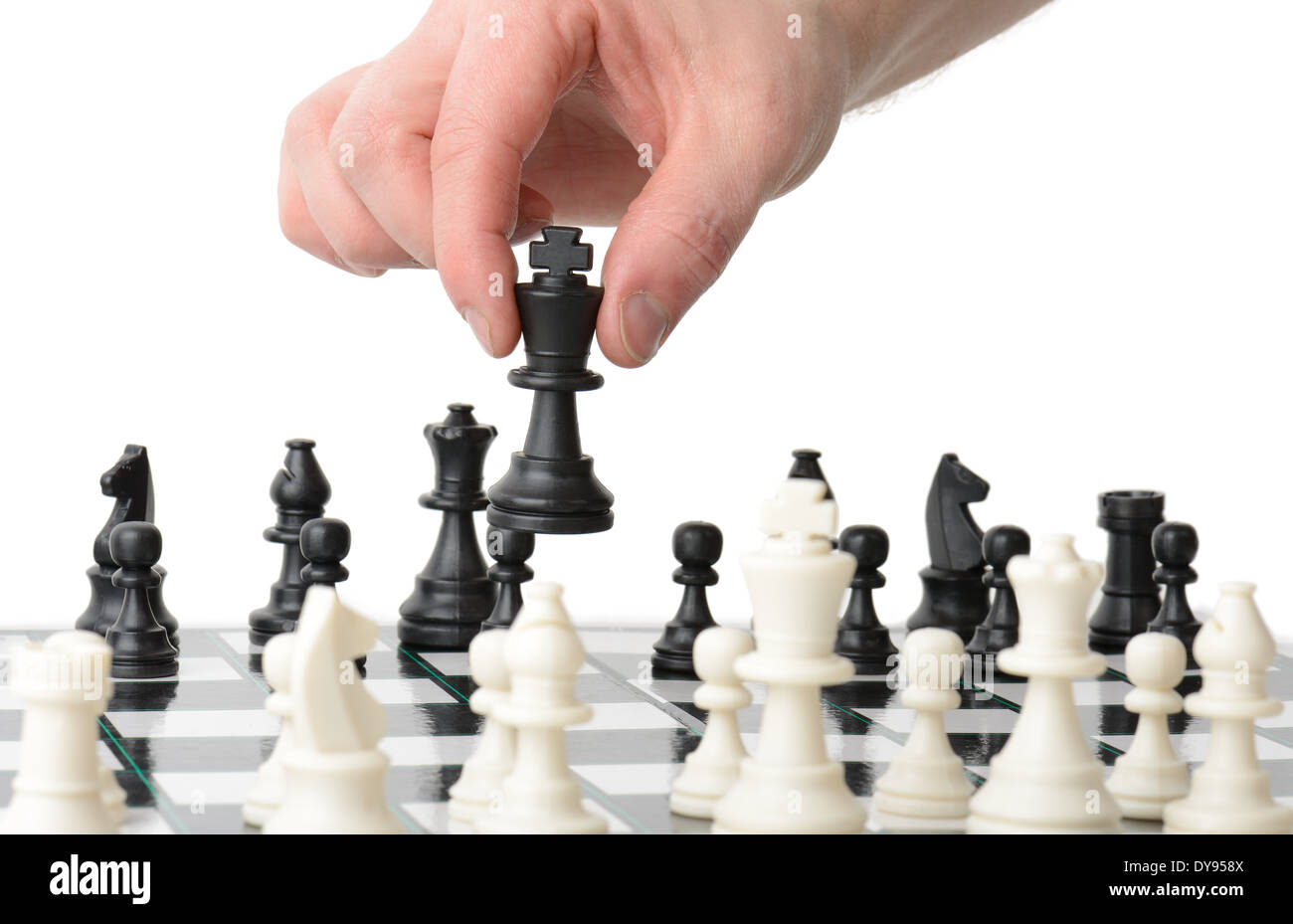 Making a strategic move isolated on a white background Stock Photo - Alamy