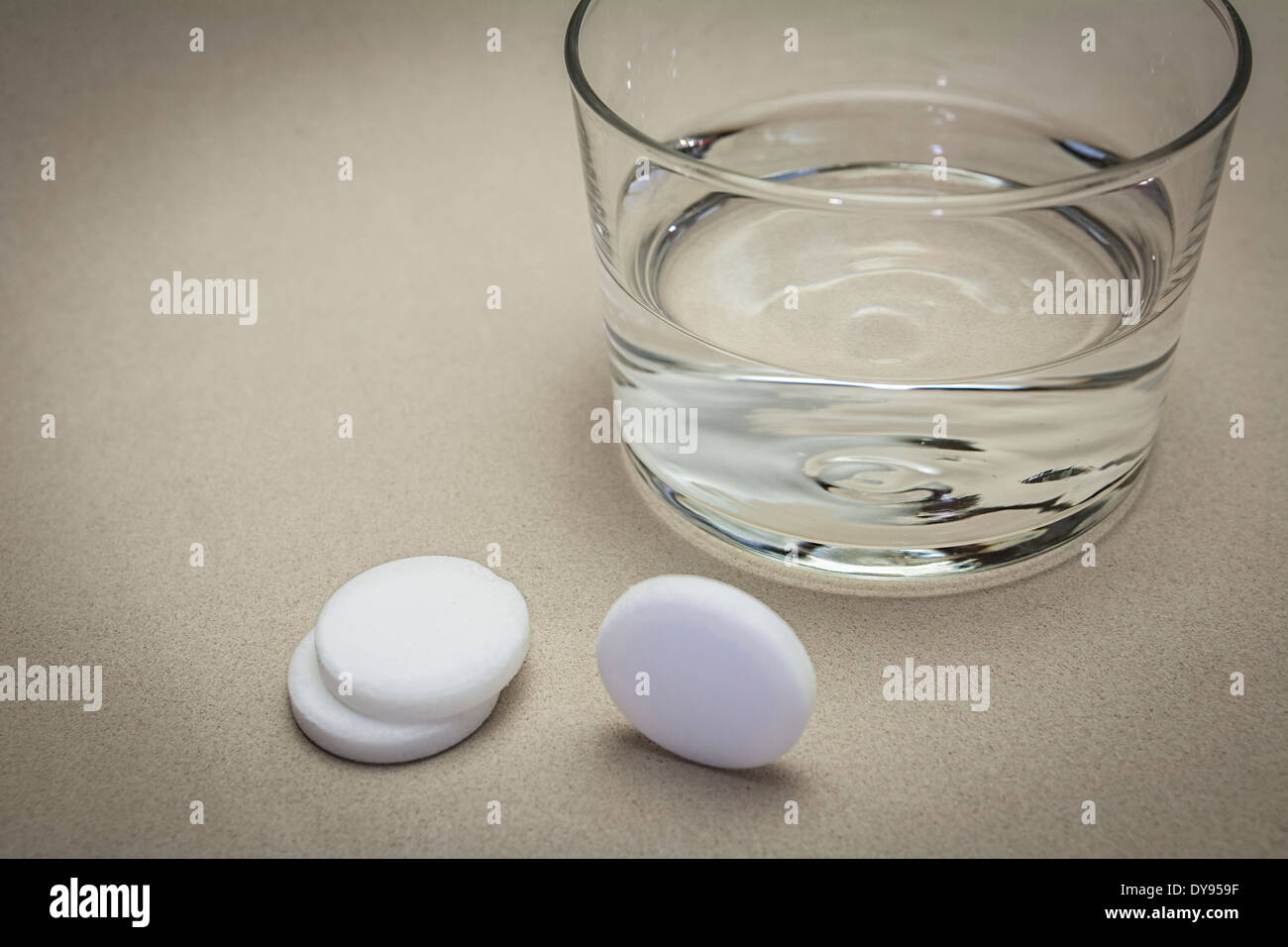 effervescent tablets and glass with water Stock Photo - Alamy