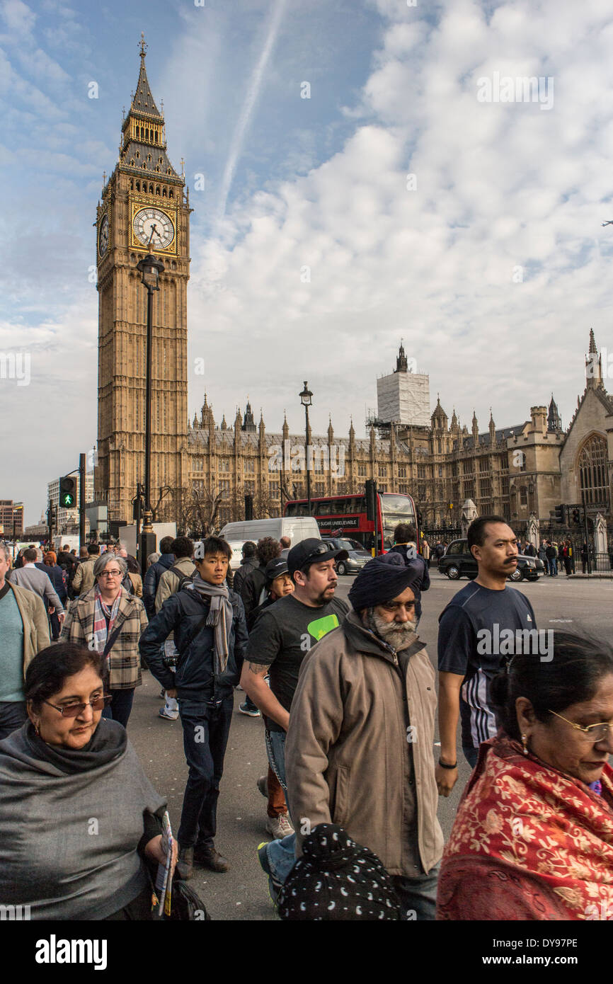 Group of people passing by Big Ben tower Stock Photo - Alamy