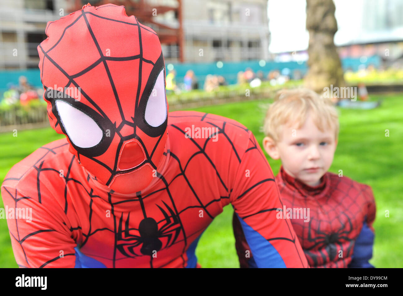 Leicester Square, London, UK. 10th April 2014. A man and boy in their ...