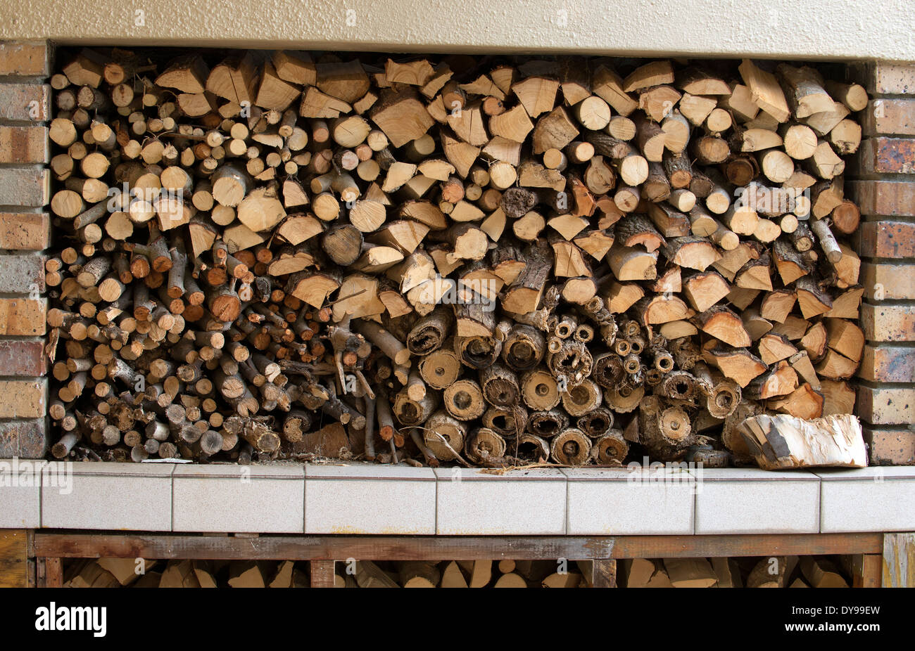 Log store. Storing winter fuel for the fire Stock Photo - Alamy
