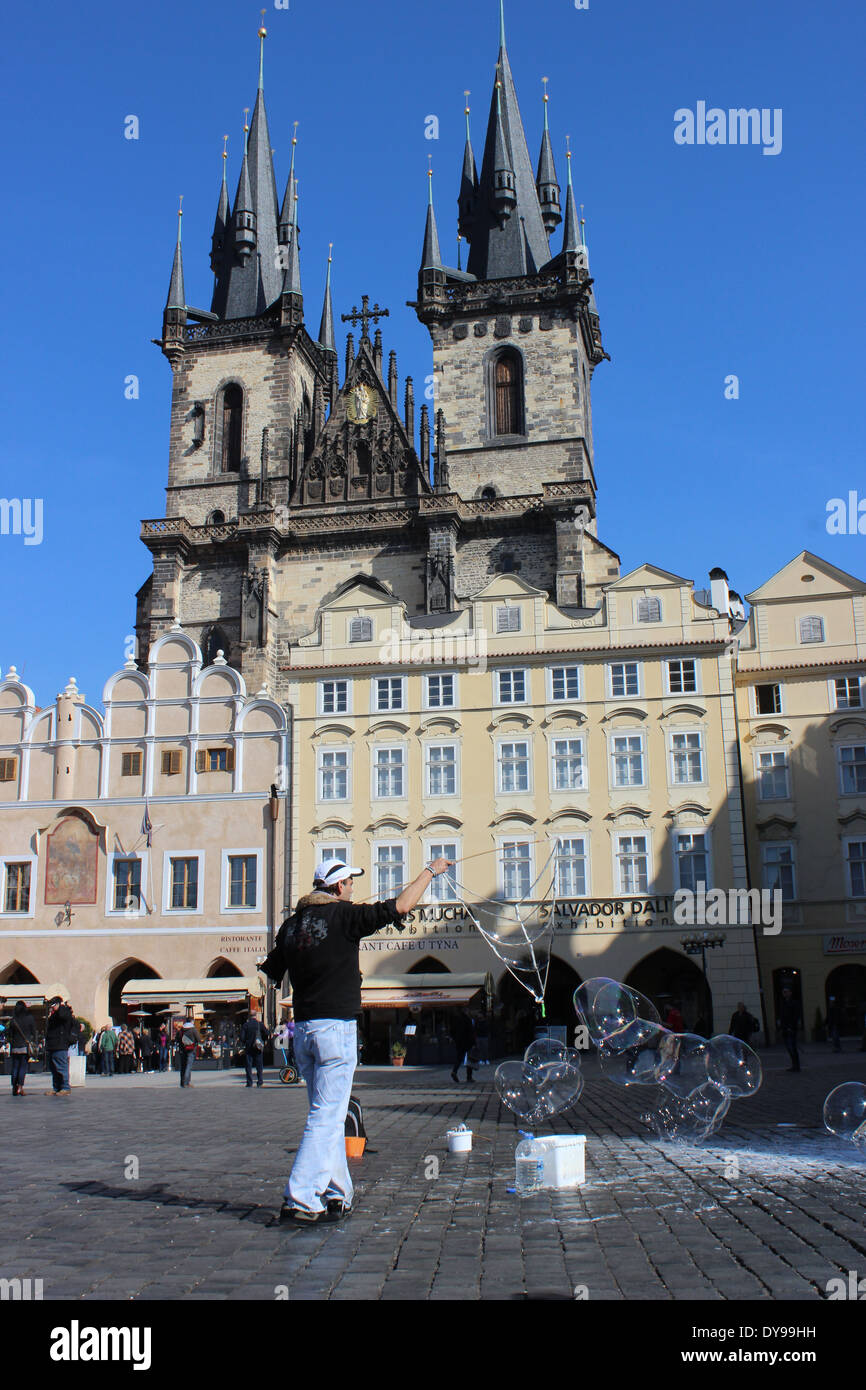 A street performer creates giant bubbles in Prague's Old Town Square ...