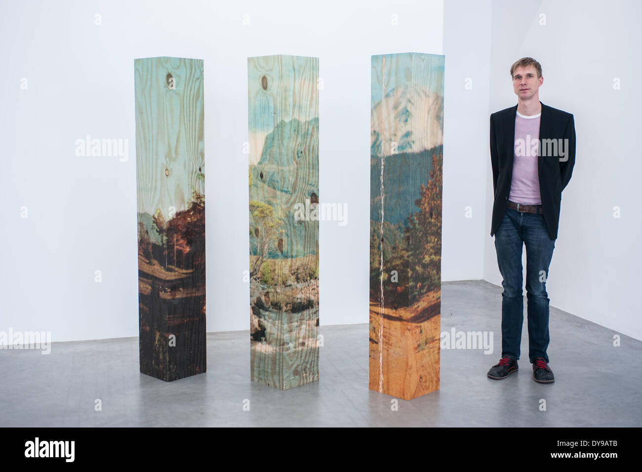 London, UK - 10 April 2014: Dutch artist Berndnaut Smilde poses next to ...