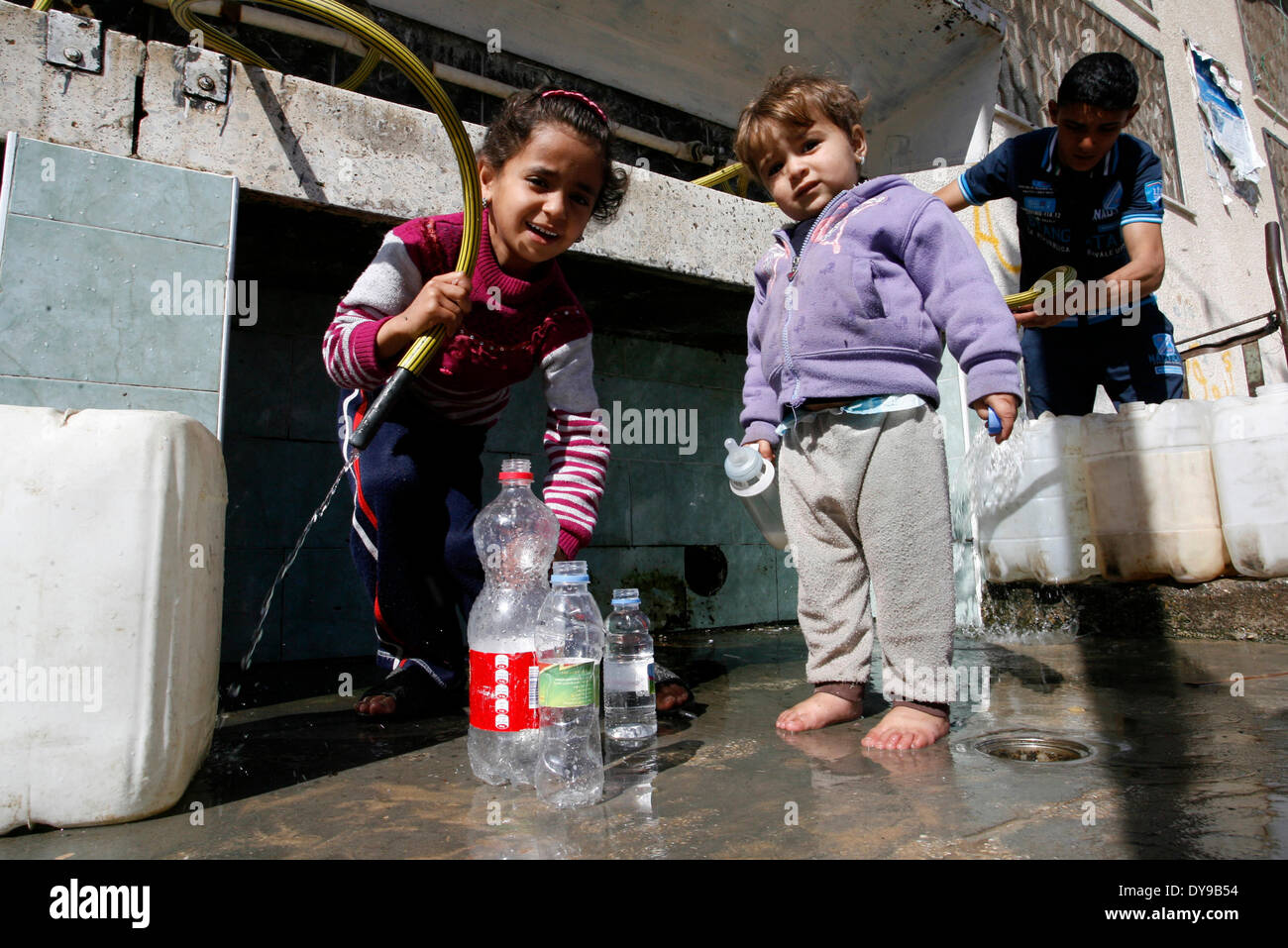 RAFAH, PALESTINE-APRIL 10: A Palestinians fill water from pipes ...