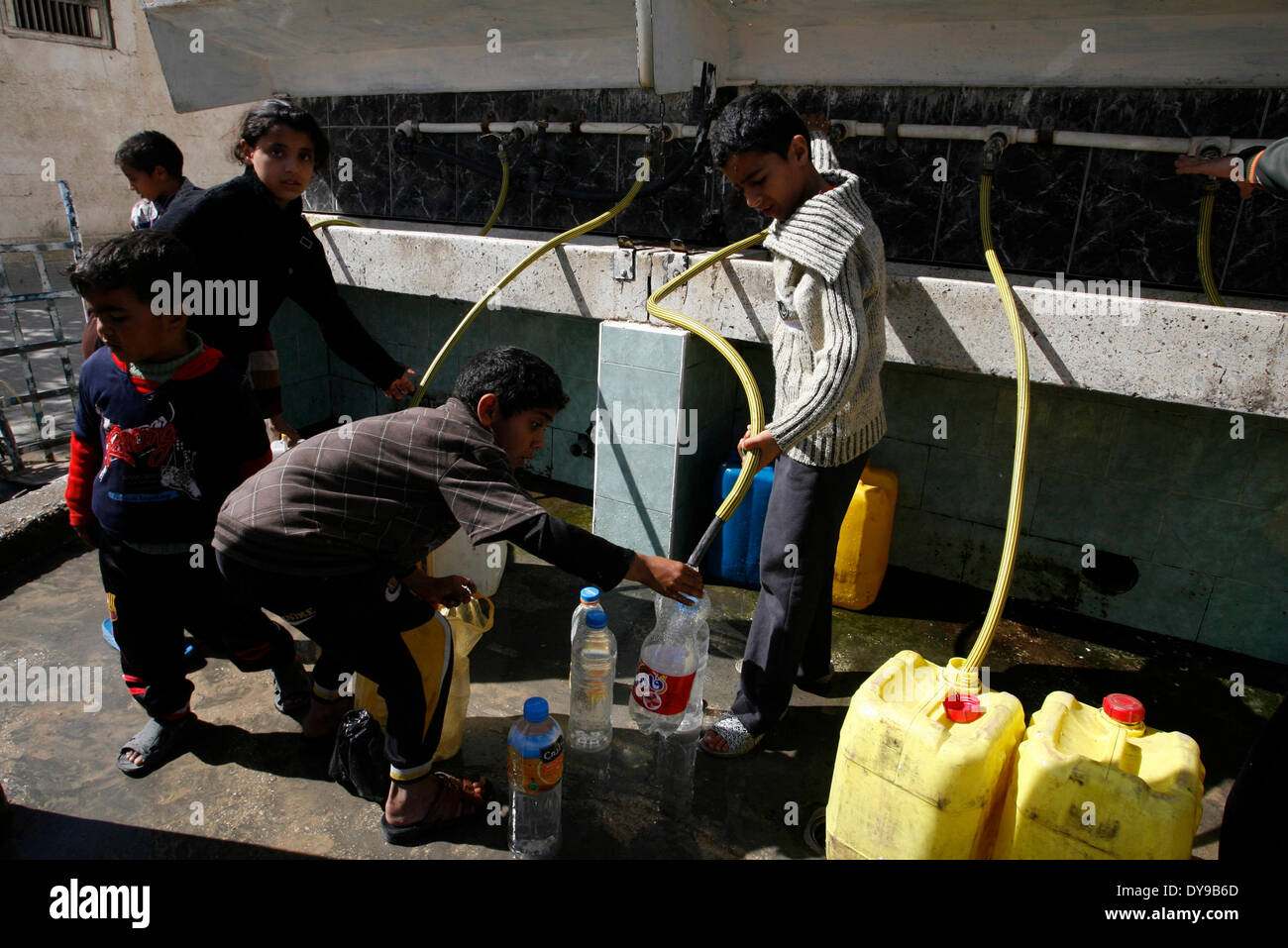 RAFAH, PALESTINE-APRIL 10: A Palestinians fill water from pipes ...