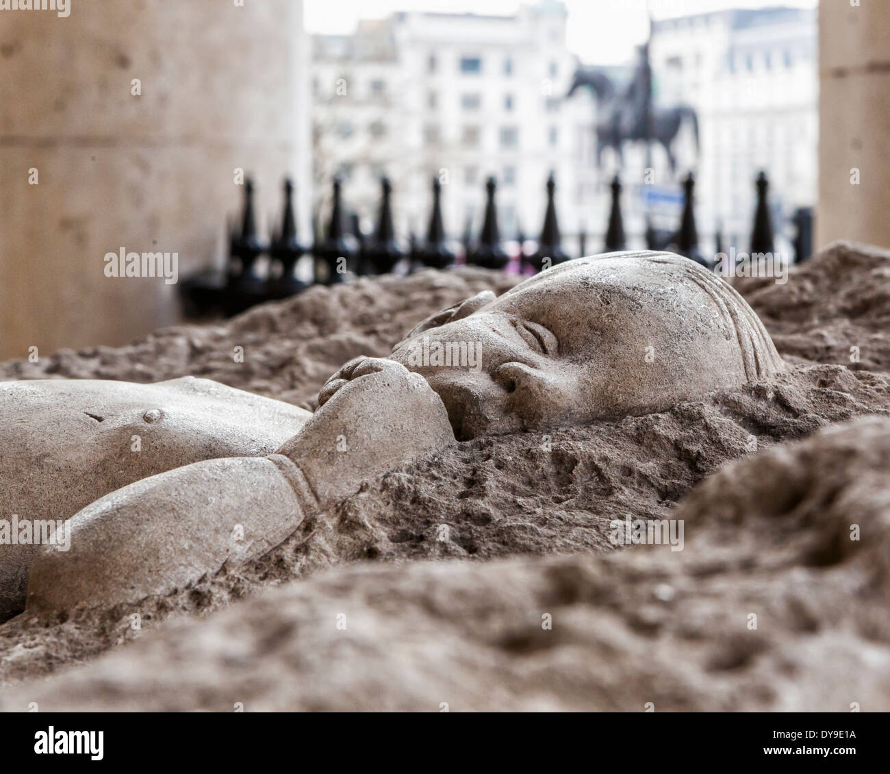 Stone sculpture of baby emerging from rock at entrance of St Martins-in ...