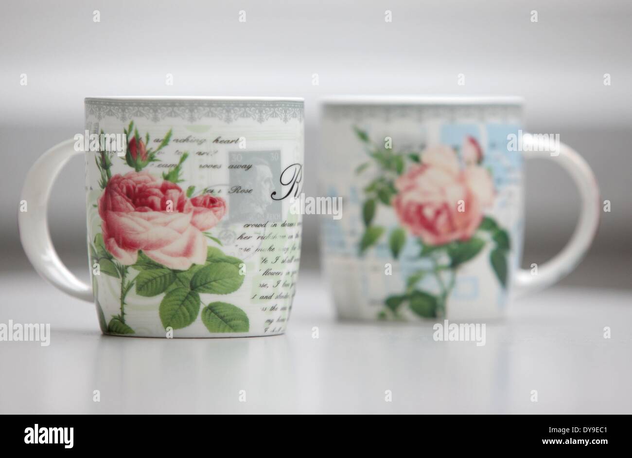 Two mugs with a print of a faded stamp with a portrait of Nazi dictator ...