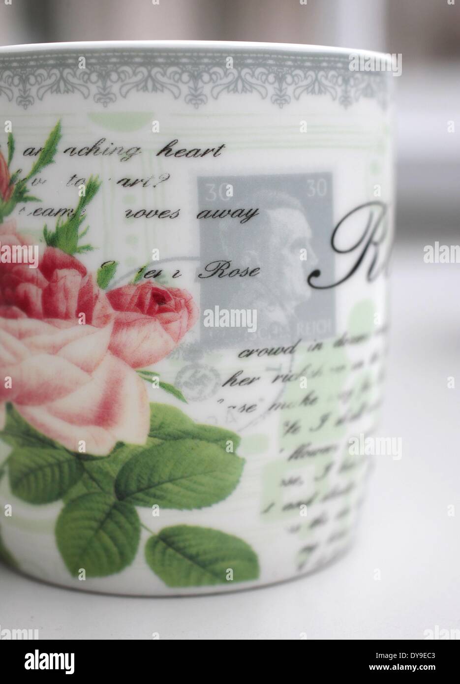 A mug with a print of a faded stamp with a portrait of Nazi dictator ...