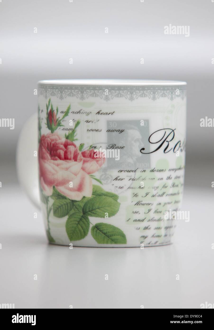 A mug with a print of a faded stamp with a portrait of Nazi dictator ...