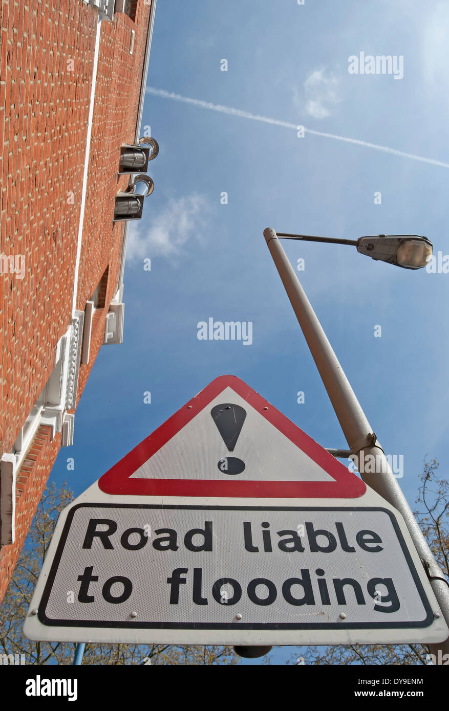road liable to flooding sign with exclamation mark above, near the ...