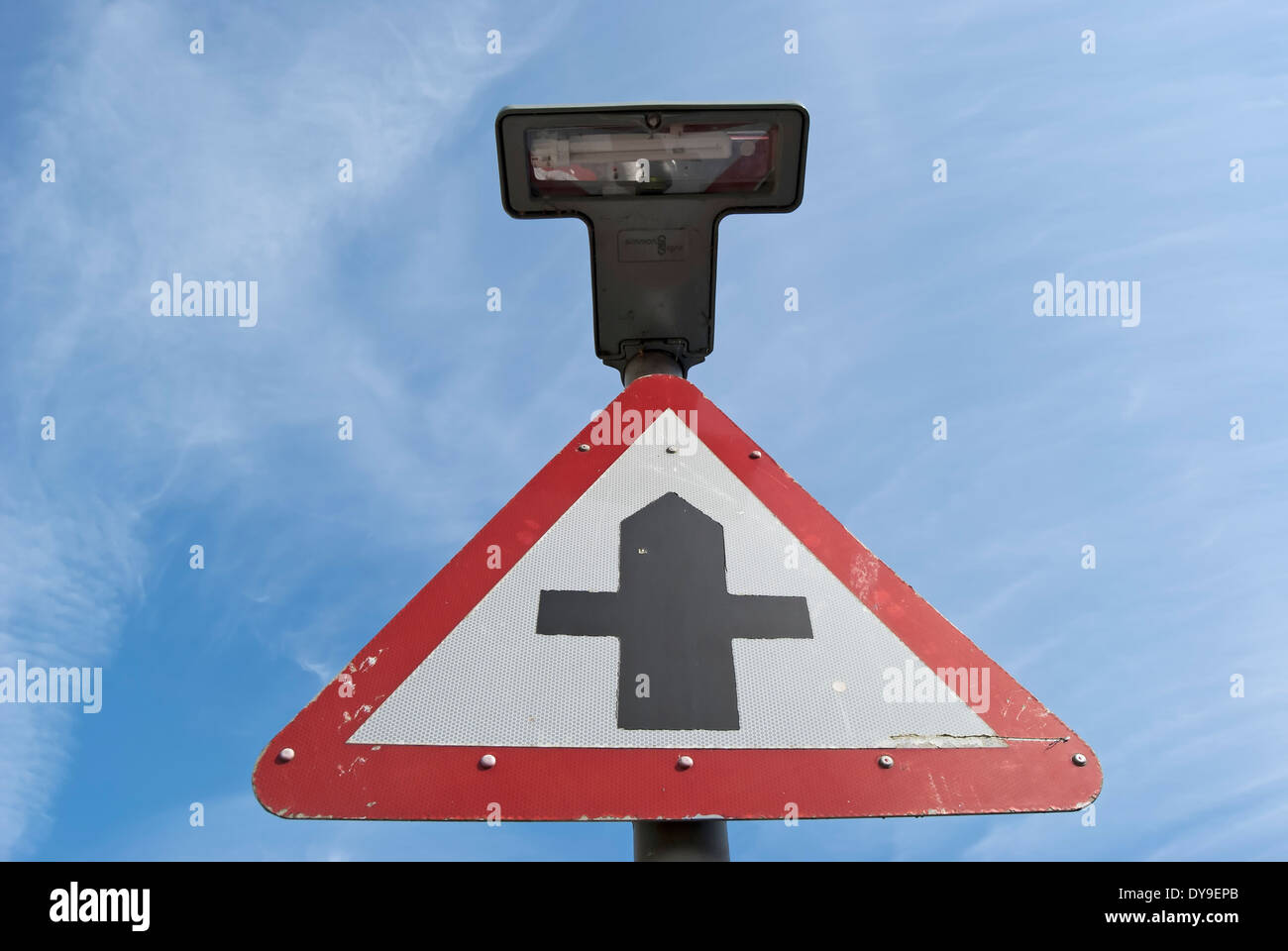 british road sign indicating a crossroads junction ahead, in barnes ...