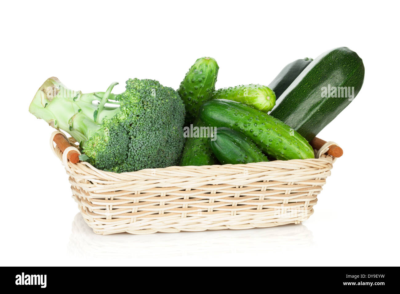 Green vegetables in basket. Isolated on white background Stock Photo ...