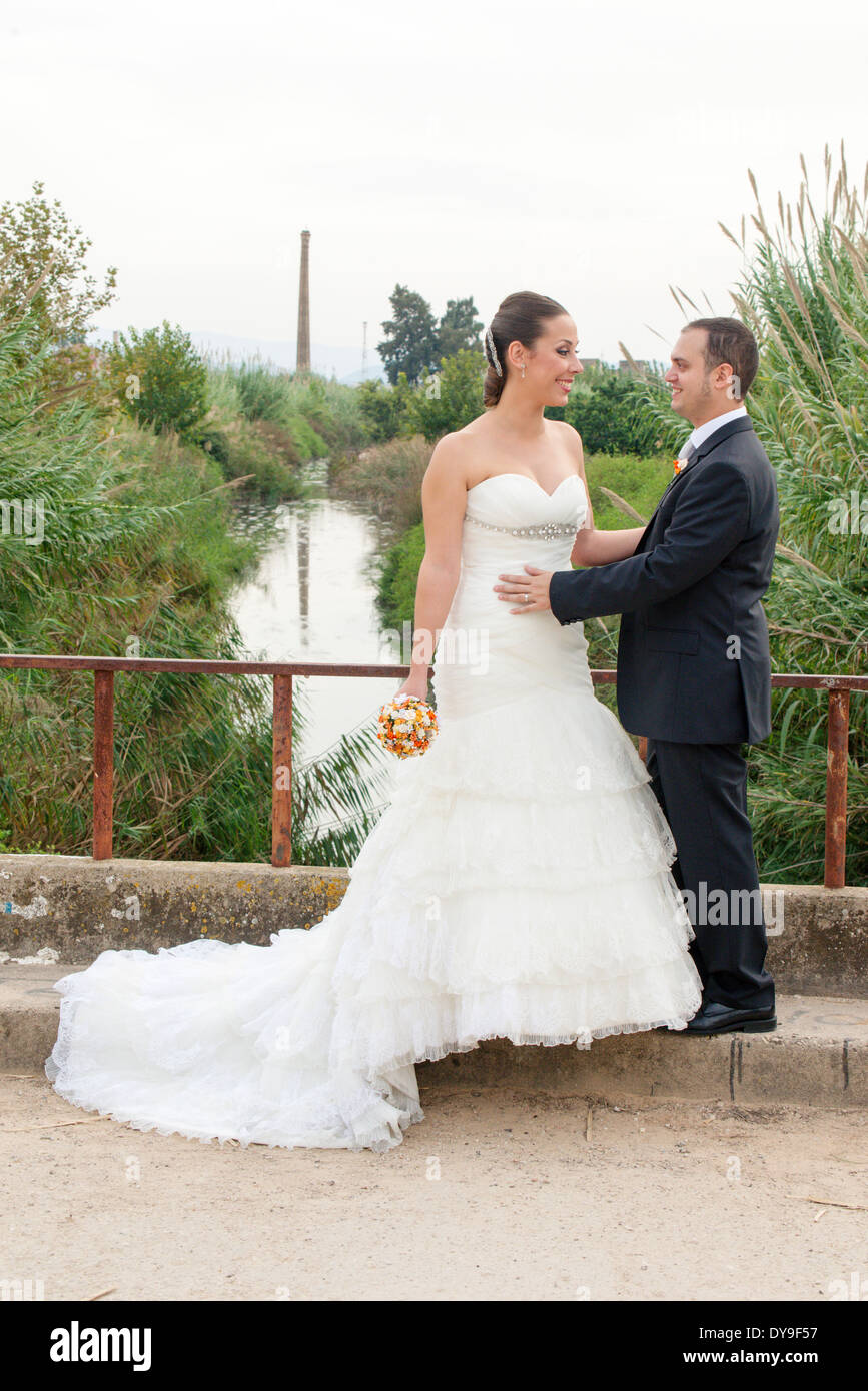 Newly married couple smile happily Stock Photo - Alamy