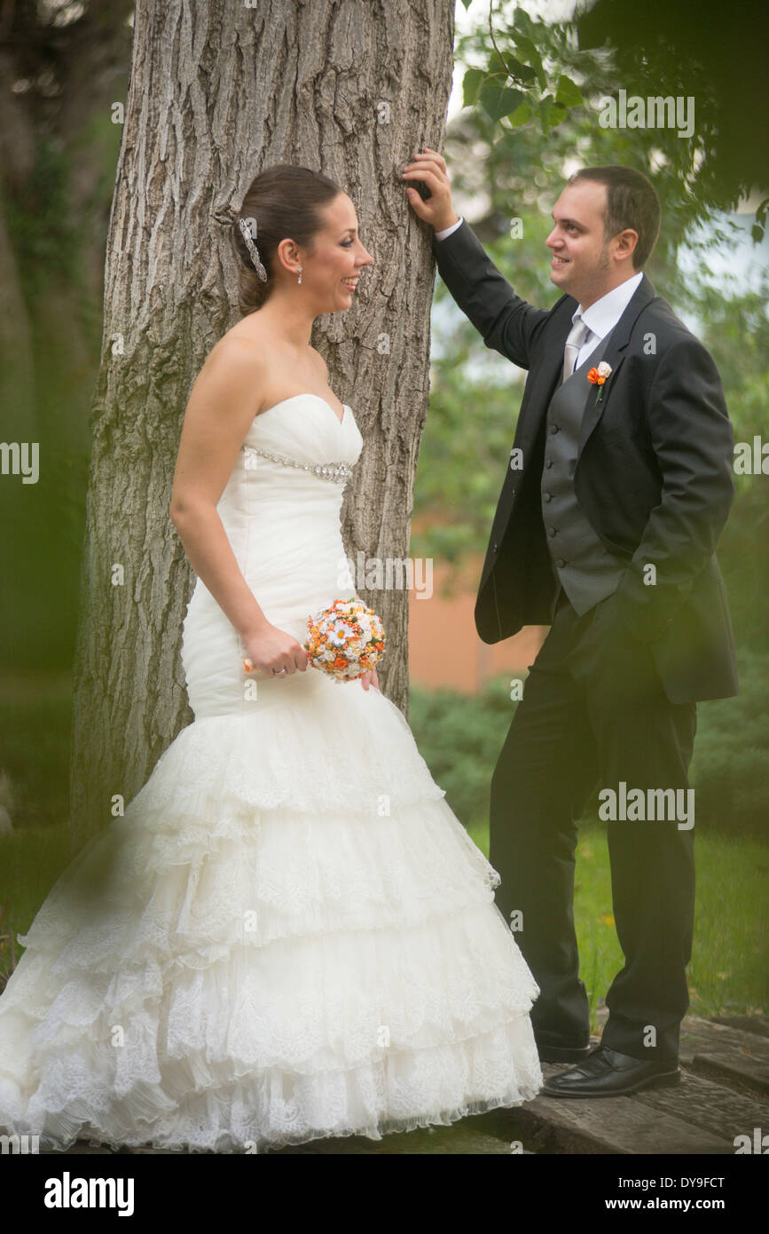 Newly married couple smile happily Stock Photo - Alamy