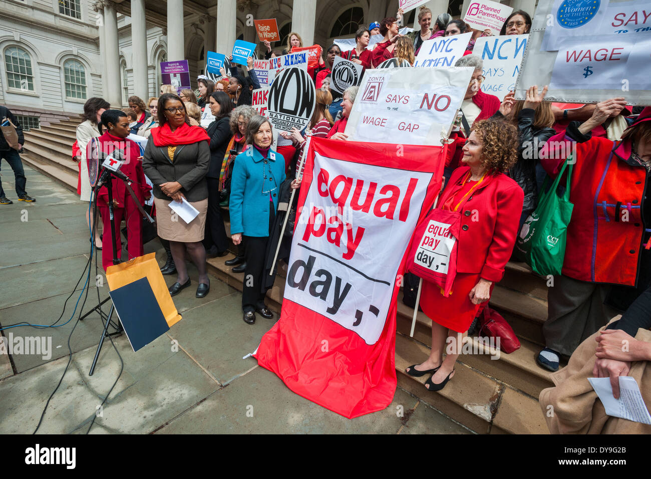 Activists, community leaders and politicians gather on the steps of ...