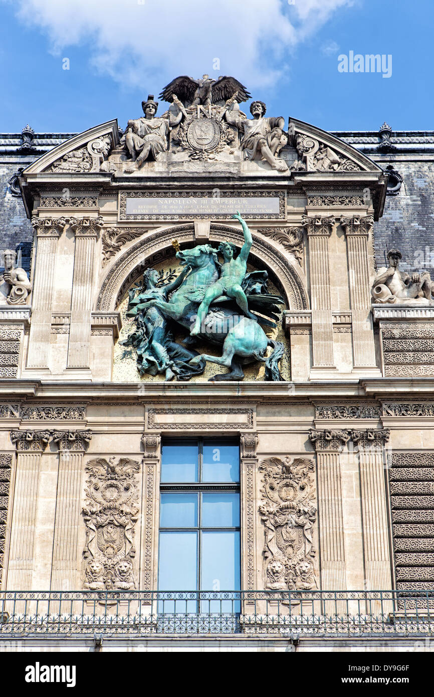 Detail from the facade of the Louvre Museum (Musee du Louvre) in Paris ...