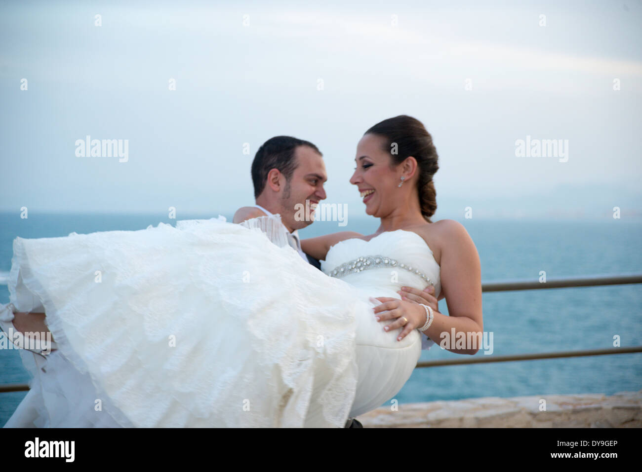 Newly married couple smile happily Stock Photo - Alamy