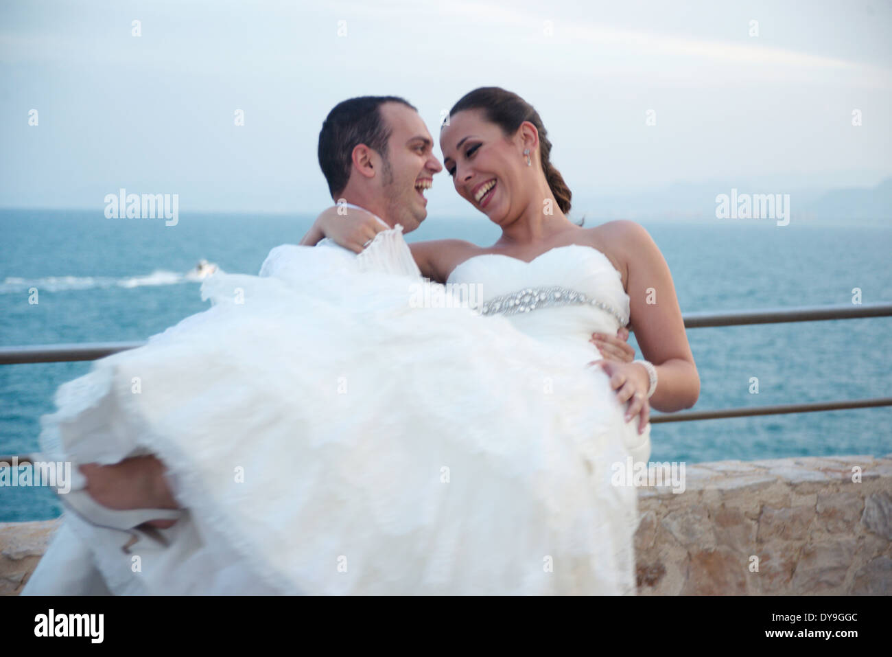 Newly married couple smile happily Stock Photo - Alamy