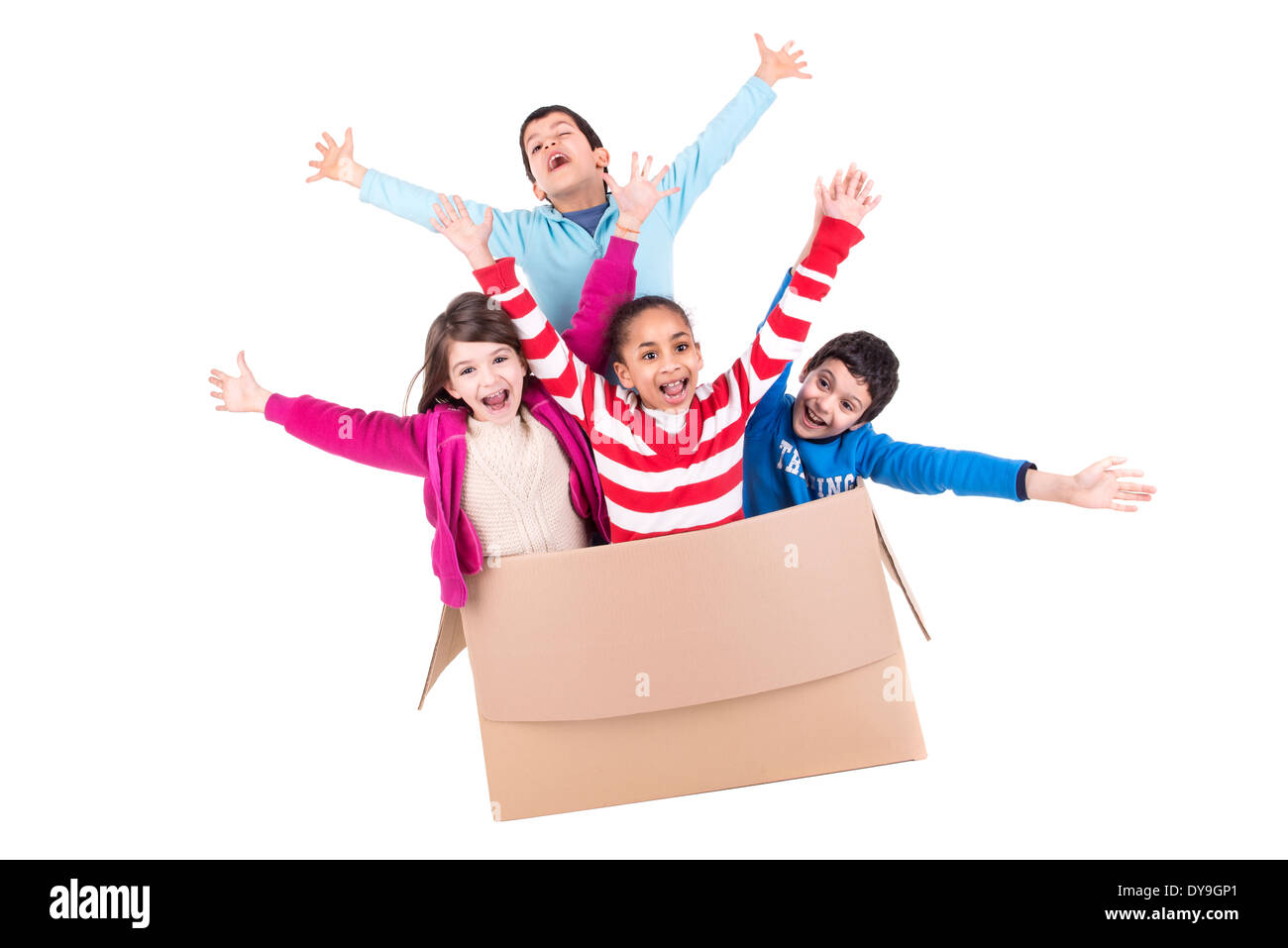 Happy kids inside a cardboard box isolated in white Stock Photo - Alamy