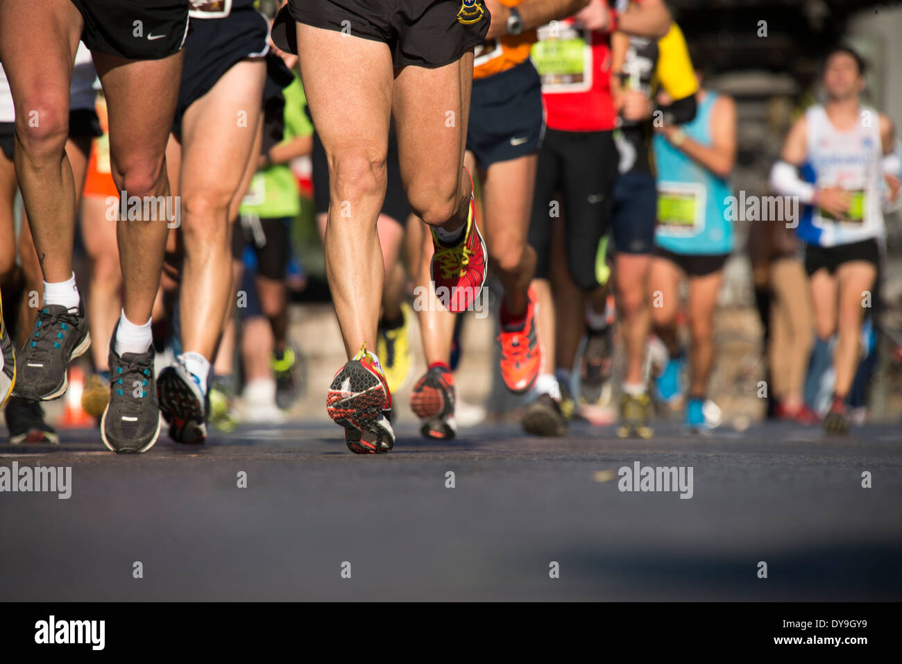 Marathoners legs in full exercise Stock Photo - Alamy