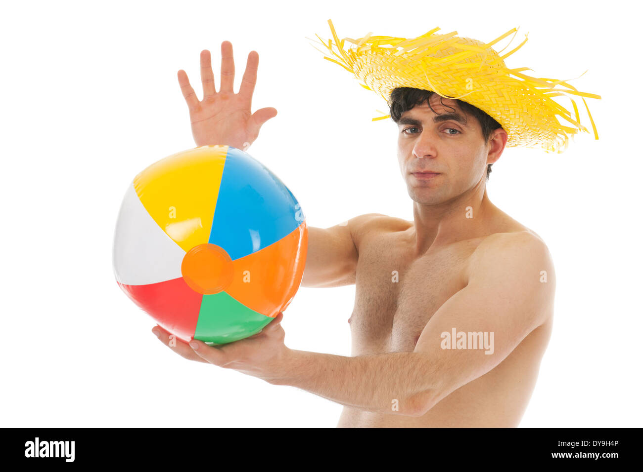 Man at the beach with many muscles and straw hat throwing ball Stock ...