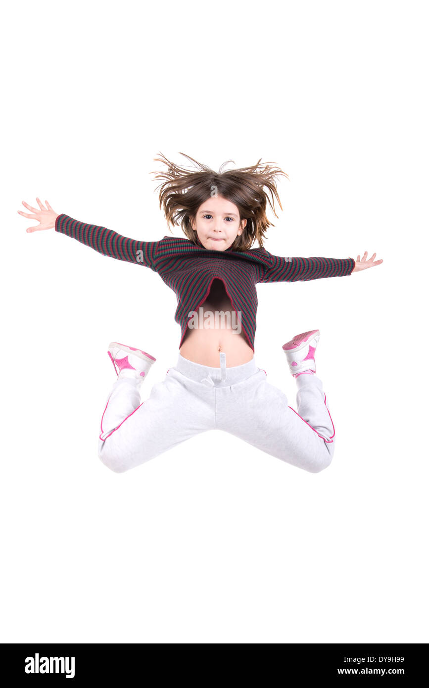 Young girl jumping isolated in white Stock Photo - Alamy