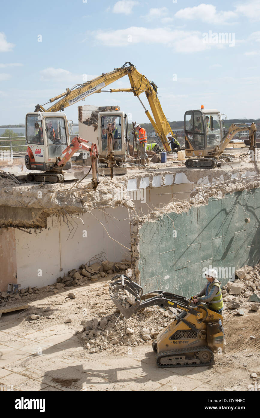 Demolition machines demolishing shops in Corby Town Centre ...