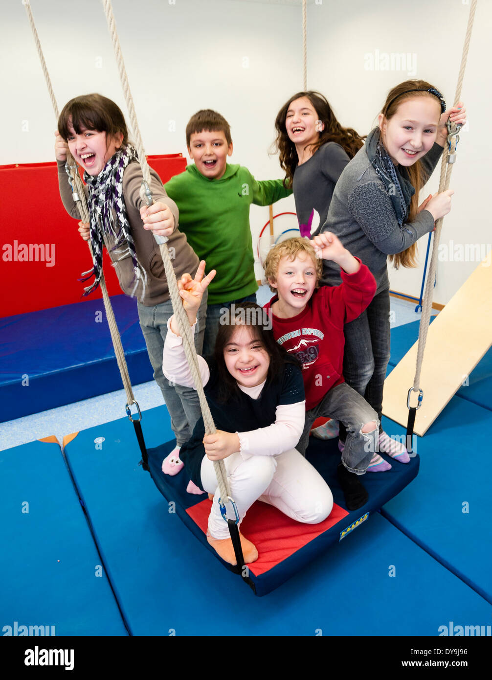 Non-disabled and disabled pupils (in this case a girl suffering from ...