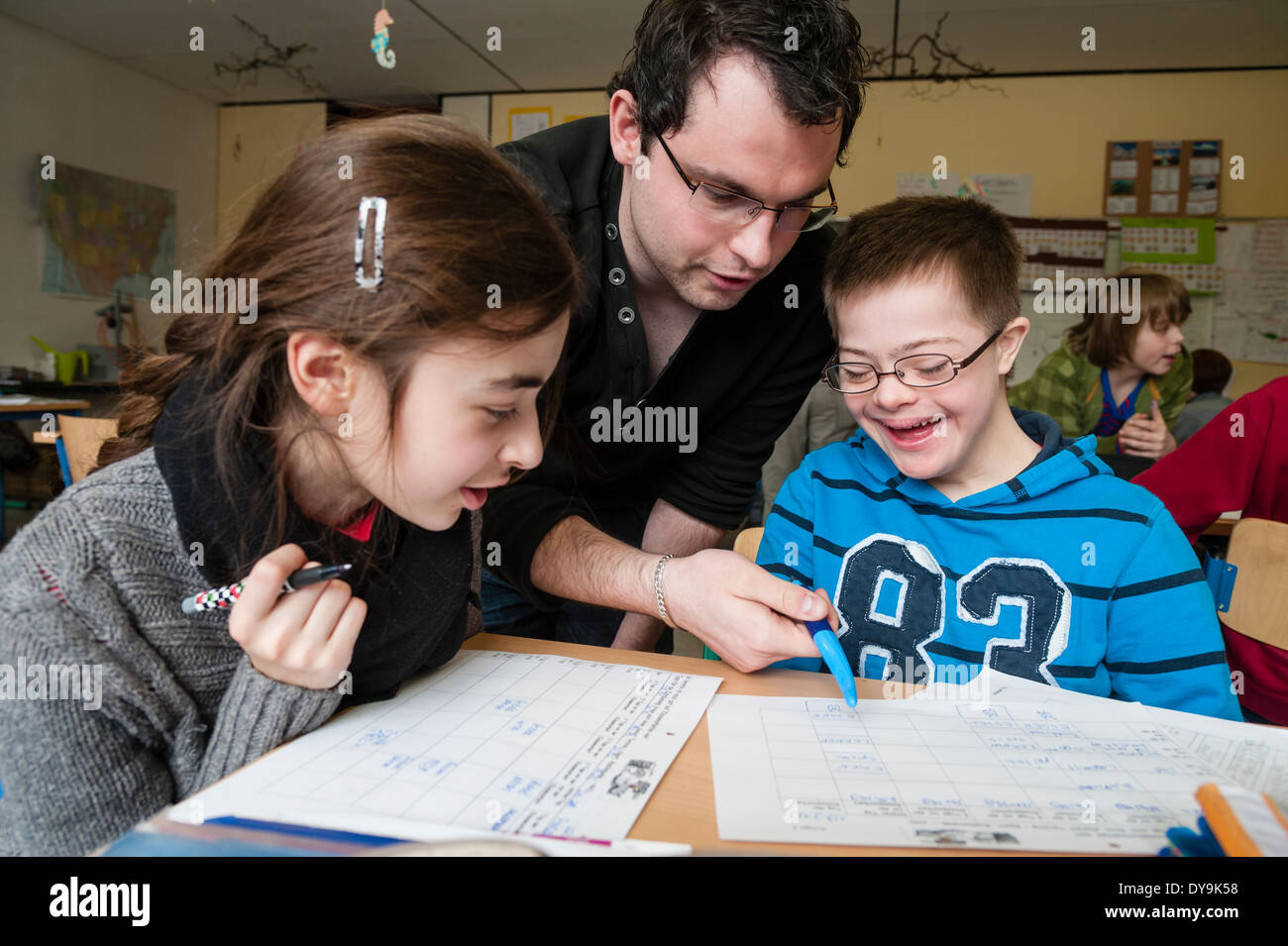 Non-disabled and disabled pupils (in this case a boy suffering from ...