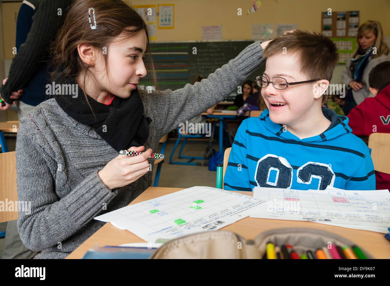 Non-disabled and disabled pupils (in this case a boy suffering from ...