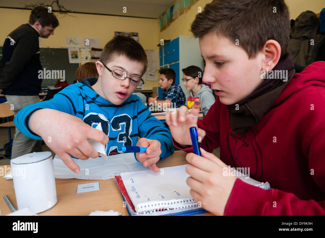 Non-disabled and disabled pupils (in this case a boy suffering from ...