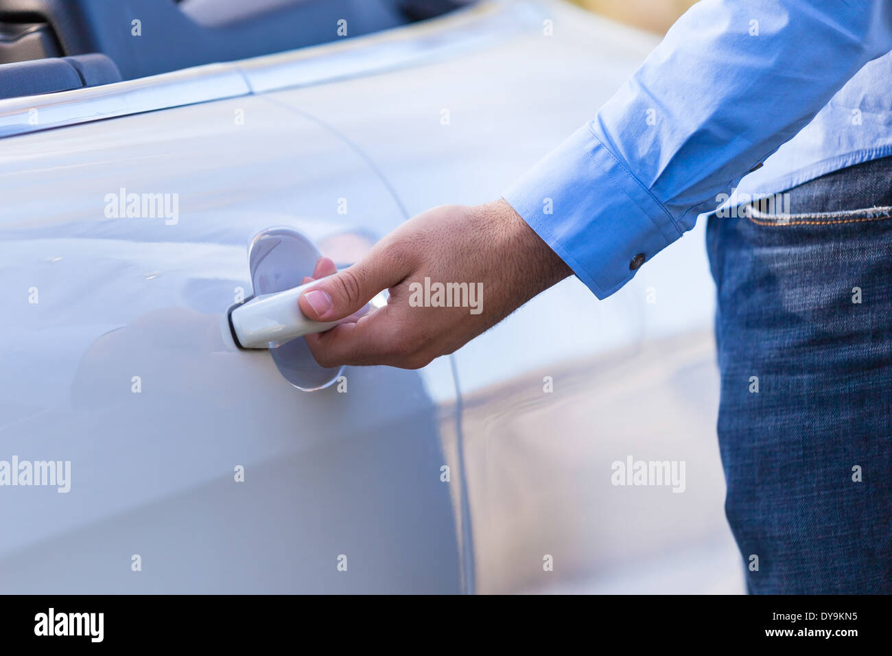 Driver opening car door hi-res stock photography and images - Alamy