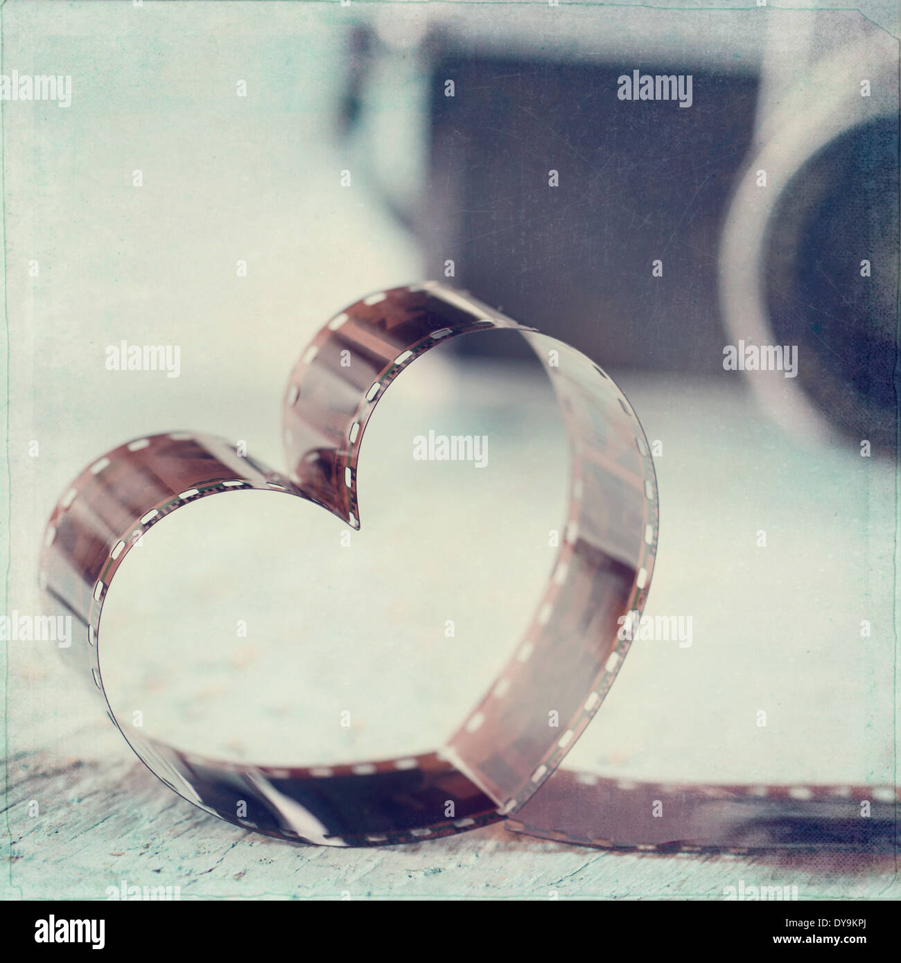 Heart shaped from film negative and old vintage camera - concept for ...