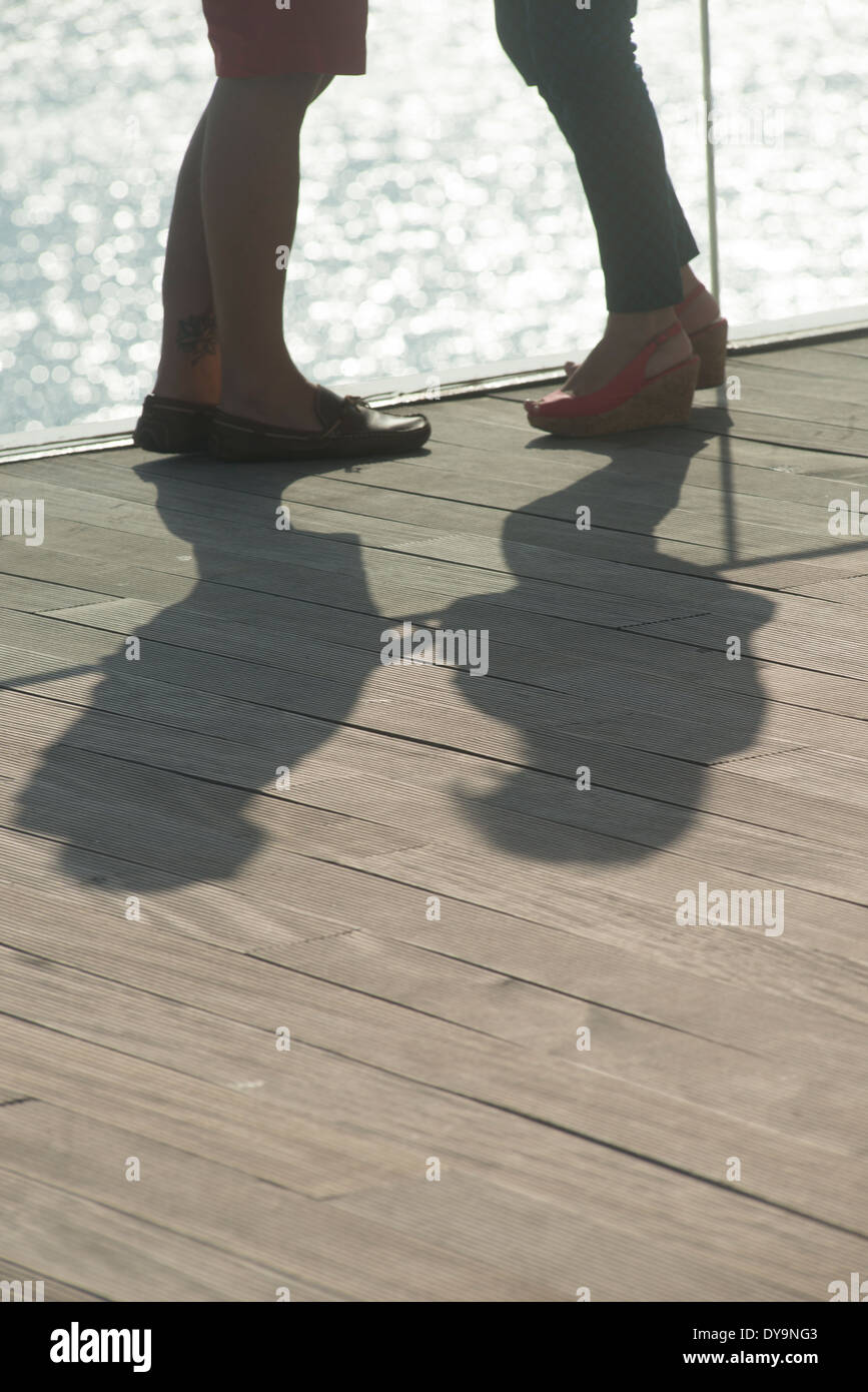 Shadow of a bride and groom at the port Stock Photo - Alamy