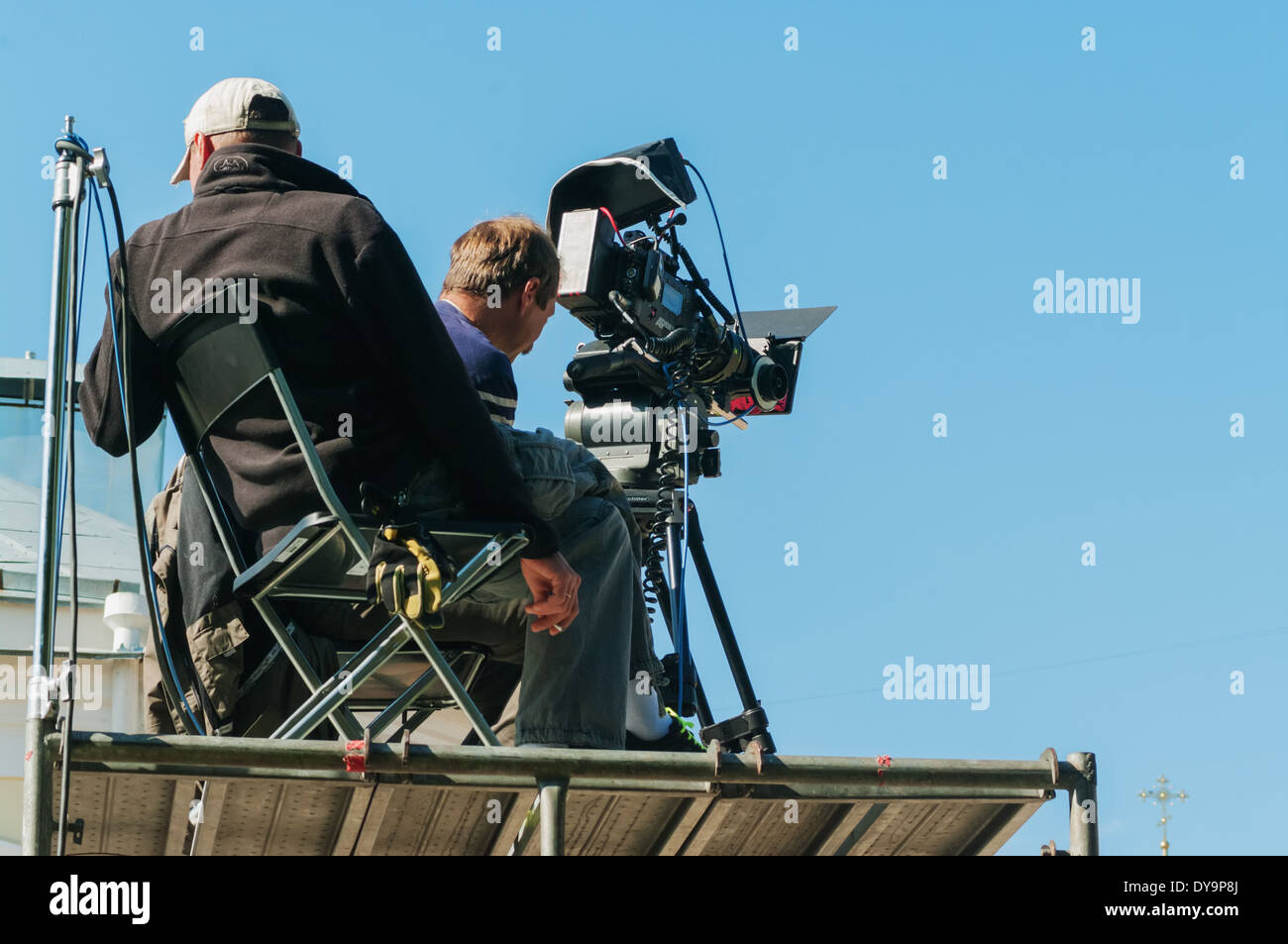 The cameraman of the movie sit on a special platform Stock Photo - Alamy