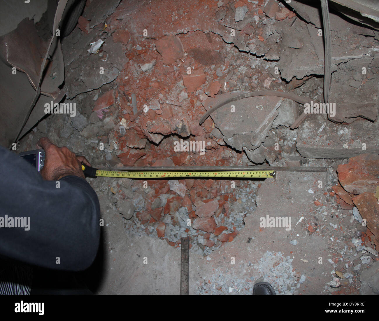 Lahore, Pakistan. 11th April, 2014. Pakistani officials collecting the ...