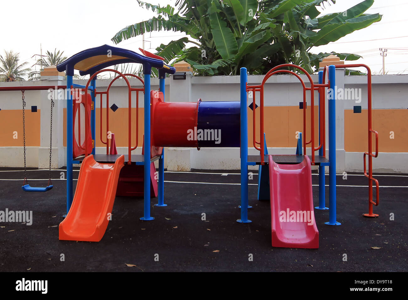 Colorful children playground in the park Stock Photo - Alamy