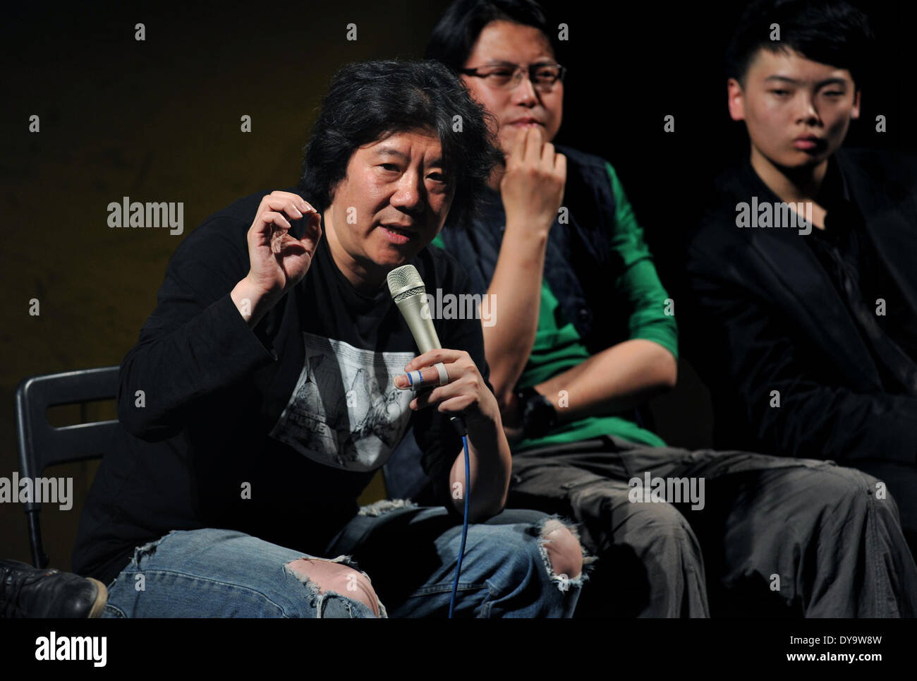 Beijing, China. 10th Apr, 2014. Director Meng Jinghui (1st L) talks ...