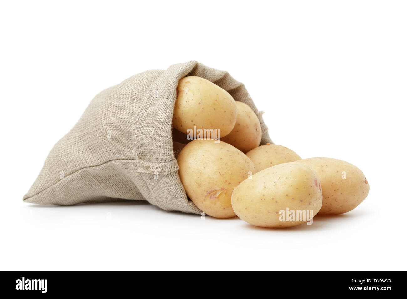 fresh young potato in sack bag, isolated on white Stock Photo - Alamy